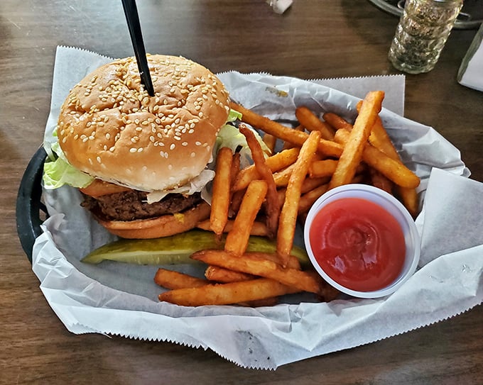A proper burger doesn't pose for Instagram – it demands your full attention and both hands. This masterpiece is why napkins were invented.