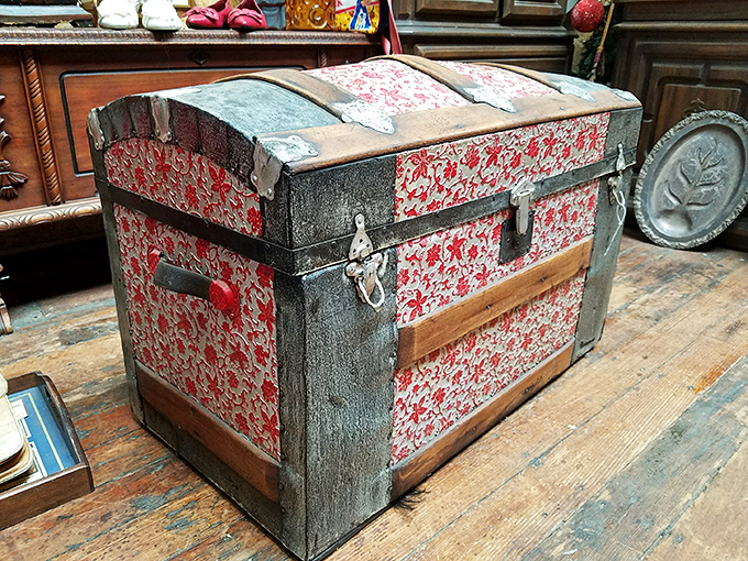 This camelback trunk has more stories to tell than your uncle after three glasses of holiday eggnog. Each scratch a chapter in its journey.