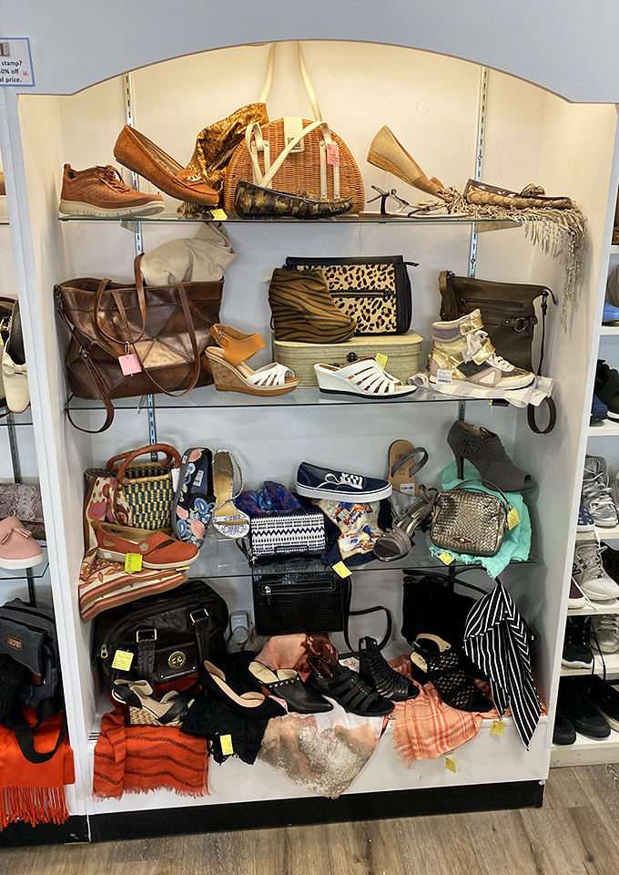 A fashionista's dream display! Shoes, bags, and accessories arranged with care—each shelf a potential Cinderella story waiting for the right owner.