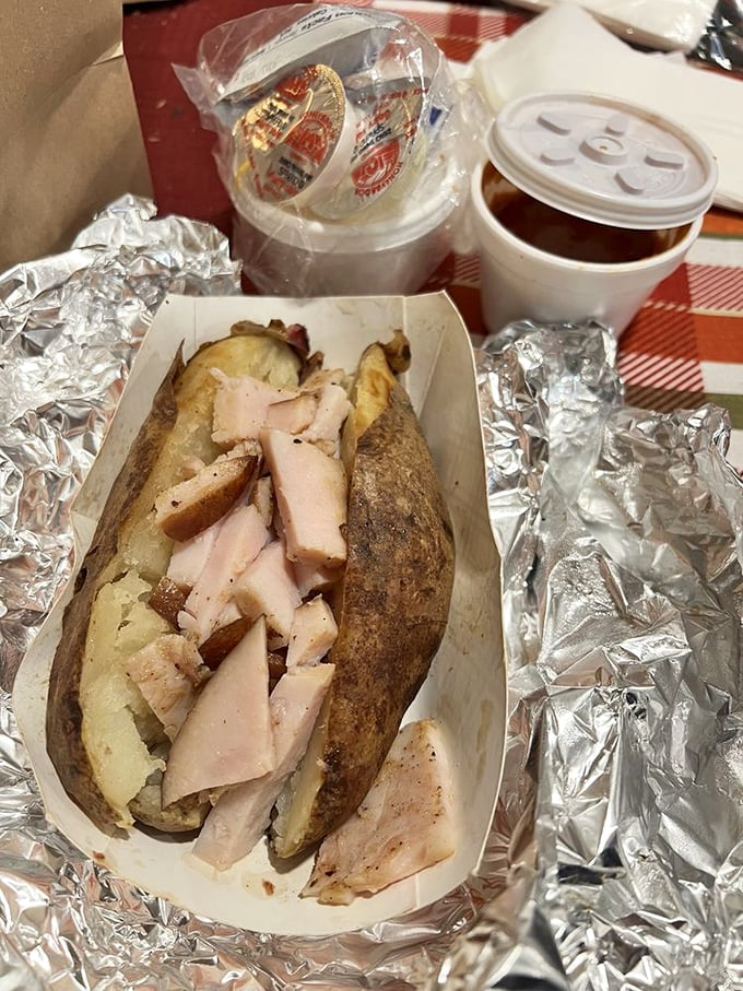 That moment when a humble baked potato becomes the perfect vehicle for smoky turkey—proof that in Texas, even the sides get the star treatment.