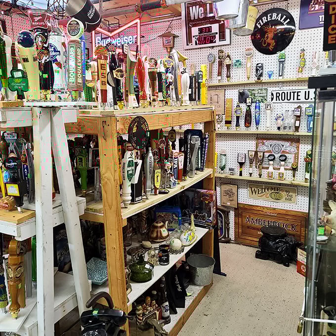 Beer tap handles stand at attention like soldiers guarding liquid gold. This shrine to sudsy memorabilia would make any man-cave enthusiast weak at the knees.