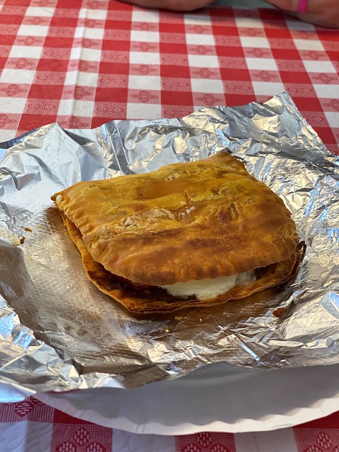 This isn't just a beef patty—it's a golden-crusted pocket of joy. Flaky exterior giving way to savory filling that makes your taste buds do the happy dance.