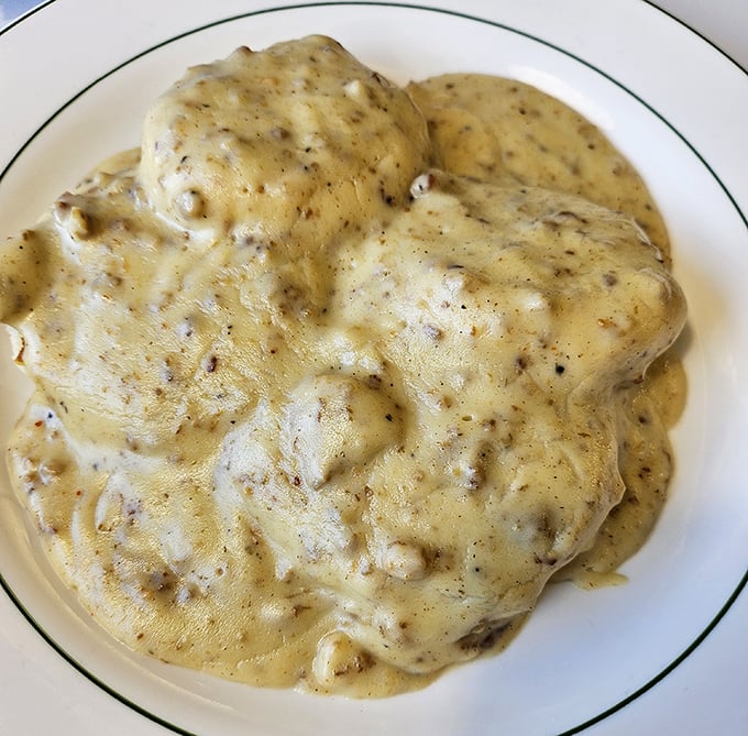 Biscuits and gravy so authentic they deserve their own Ohio historical marker—a creamy, peppery blanket of pure comfort.