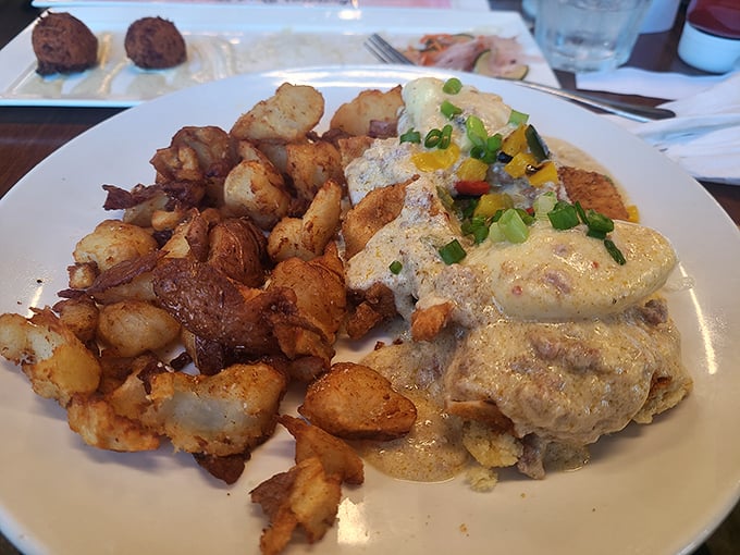 This isn't your grandmother's biscuits and gravy—unless your grandmother was a culinary genius who understood the perfect potato-to-gravy ratio.