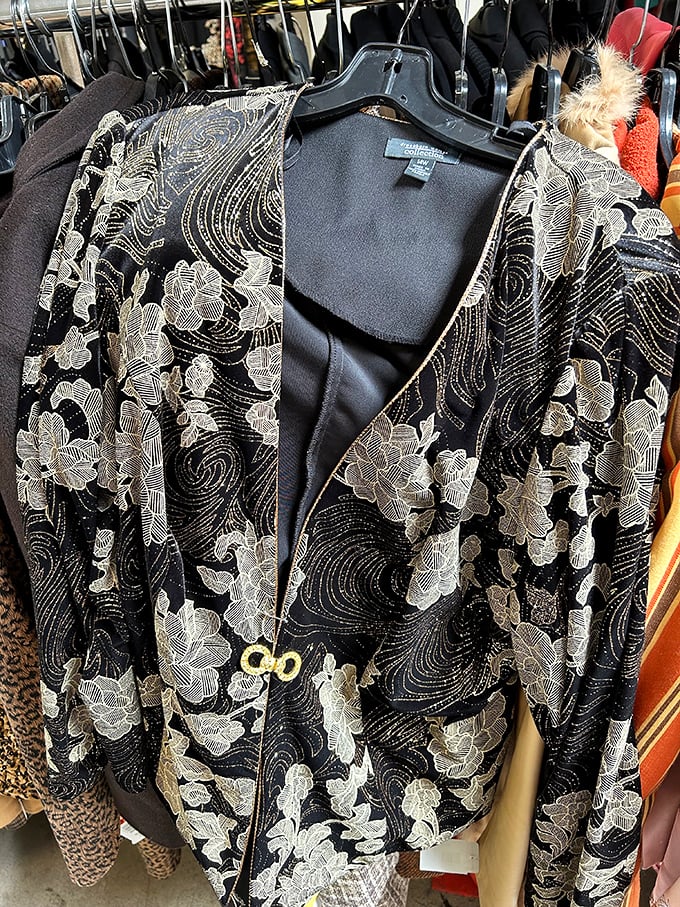 This embellished black and gold blazer isn't just clothing—it's someone's former statement piece waiting for its second act on a new stage.