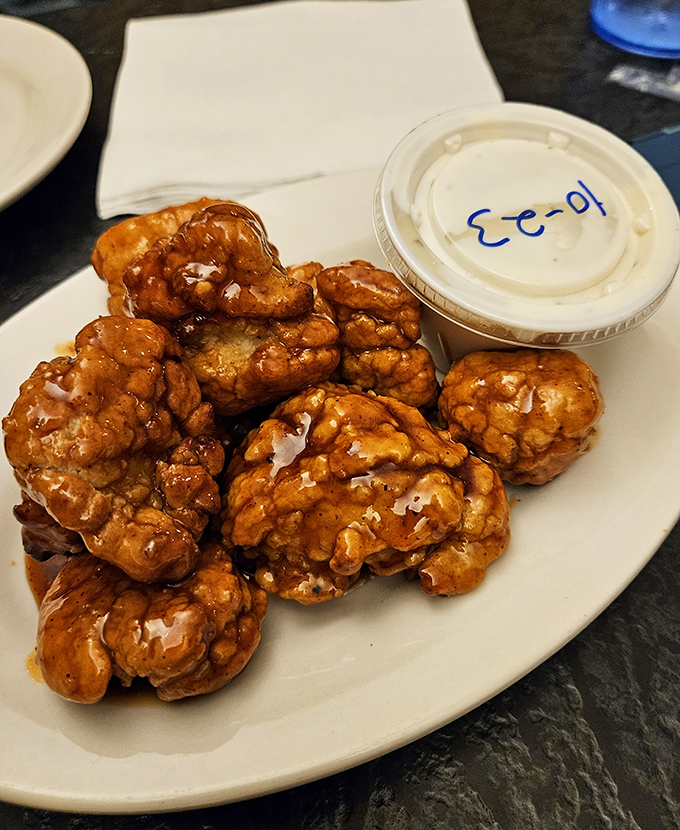 These honey-glazed boneless wings aren't trying to win beauty contests – they're too busy conquering taste buds instead.