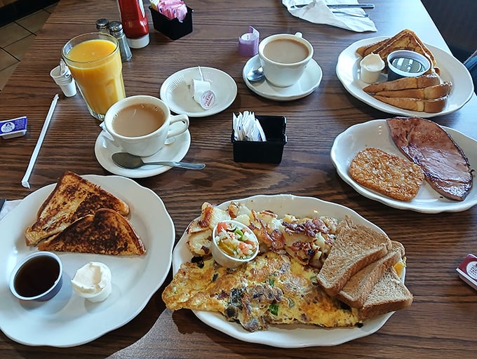 Breakfast nirvana: golden omelets, crispy toast, and coffee that keeps coming. The morning trifecta that makes getting up worthwhile.