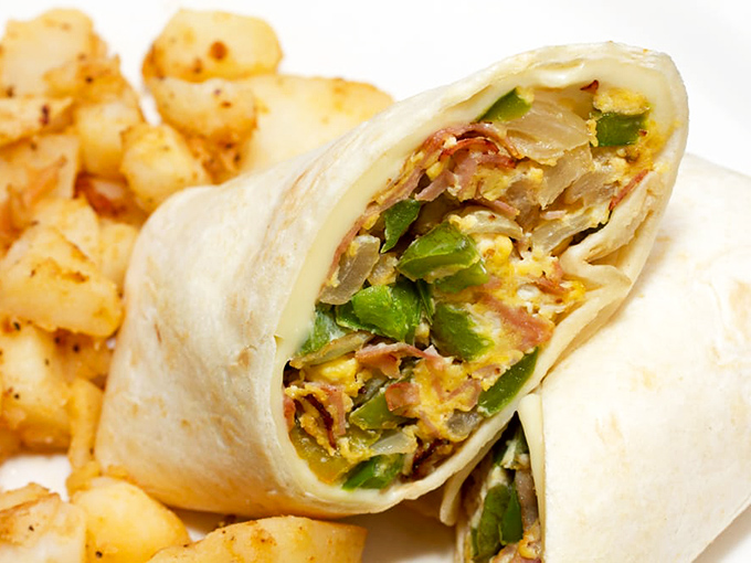 This breakfast burrito doesn't just start your day—it launches it into orbit with a perfect balance of eggs, veggies, and that hint of bacon magic.