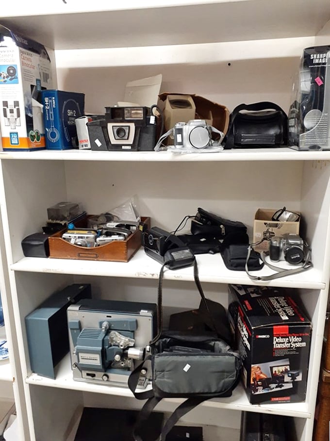 Vintage tech heaven for analog enthusiasts. That film projector might have shown someone's family vacation slides from the Carter administration!