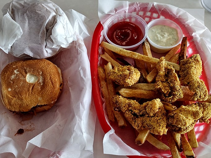 Golden-brown catfish nuggets and crispy fries – proof that sometimes the simplest pleasures are the most profound. That cornmeal crust deserves a Nobel Prize.