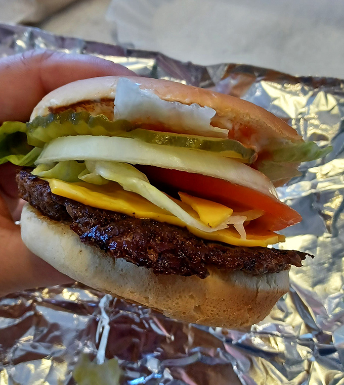 This isn't just a cheeseburger; it's edible proof that perfection doesn't require complexity—just quality ingredients and decades of know-how.