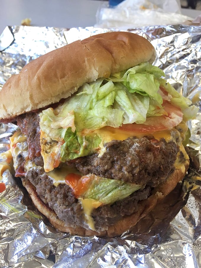 This isn't just a cheeseburger; it's a monument to beef artistry. The kind of burger that makes you involuntarily close your eyes with each bite.