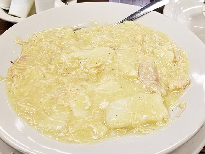 The legendary chicken and dumplings—a creamy, soul-warming pool of tender chicken and pillowy dumplings that locals will drive across town for on a cold day.