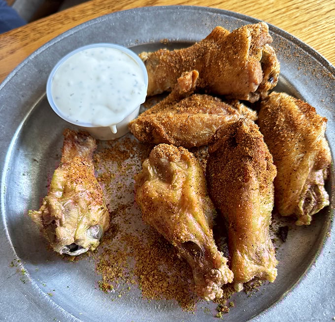 These aren't just wings—they're crispy, golden-brown time machines that transport you to a simpler time when calories didn't count and napkins were mandatory.
