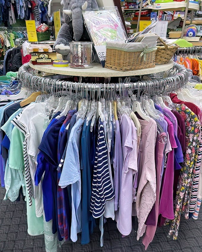 The circular clothing displays aren't just practical—they're a rainbow of possibilities where every hanger might hold your next favorite shirt or that perfect dress.