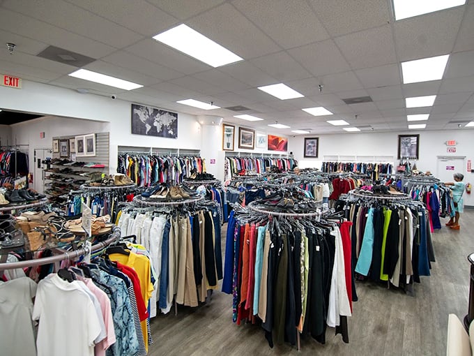 Racks upon racks of meticulously organized clothing await their second act—color-coded for the serious thrifter's convenience.