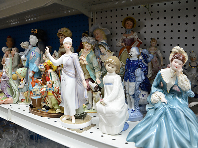 The figurine section: where porcelain personalities silently compete for your attention and shelf space. Each one has a story—and wants to tell it in your living room.