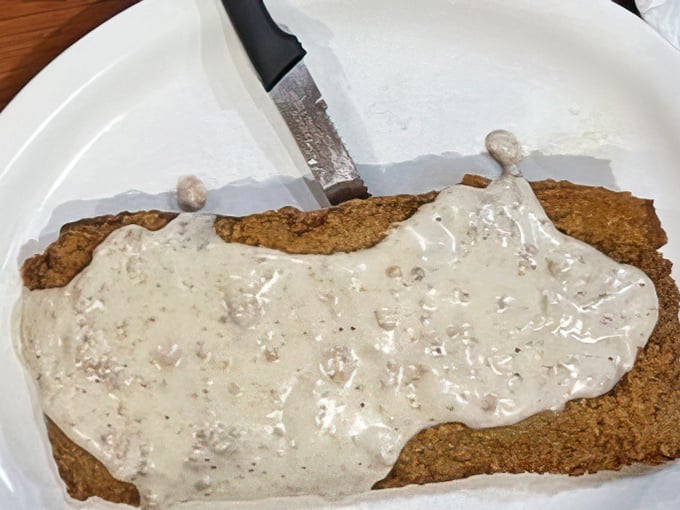 The star of the show: country fried steak bathed in peppery gravy. Vegetarians, avert your eyes—this is carnivore territory at its finest.