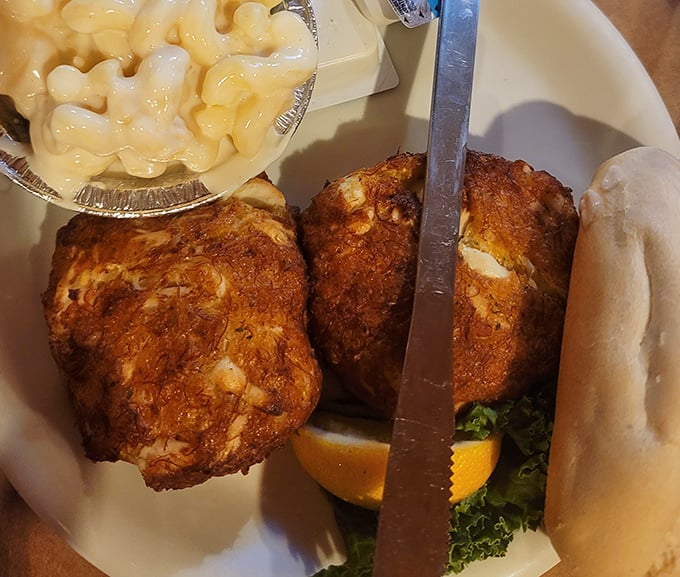 These golden-brown crab cakes aren't just food—they're little discs of happiness, packed with jumbo lump crab meat and minimal filler. Pure Maryland magic.