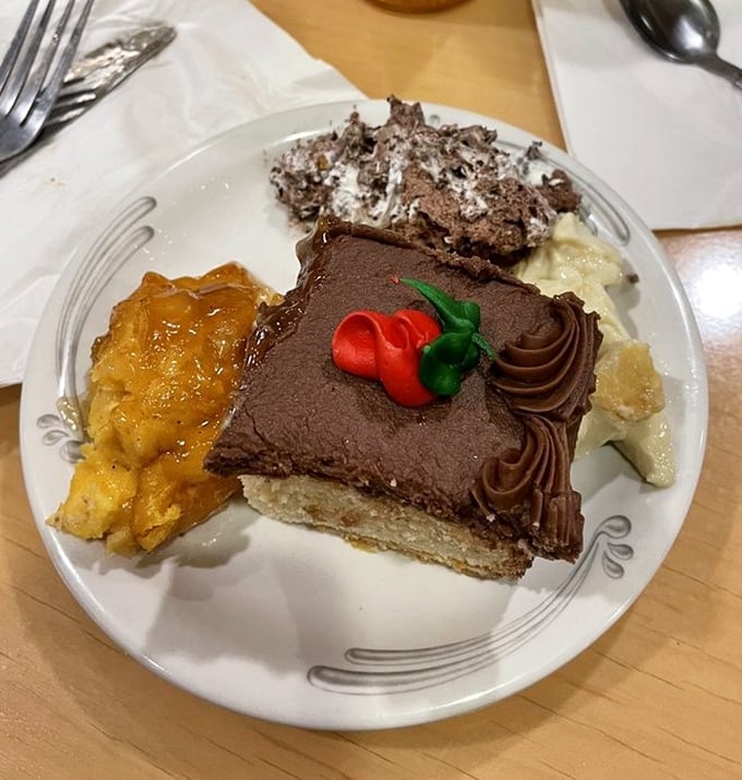 Dessert heaven on a plate. That chocolate cake isn't just calling your name – it's shouting it through a megaphone.