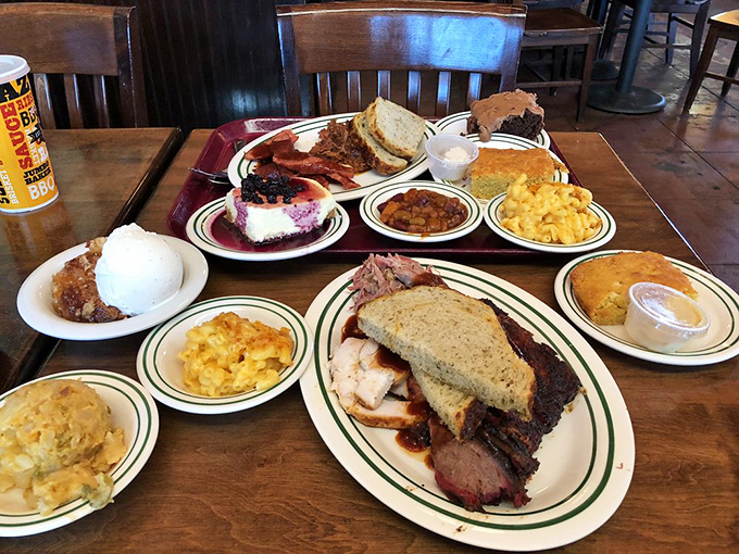 A barbecue spread that would make a vegetarian question their life choices. This isn't a meal; it's a celebration on a plate.