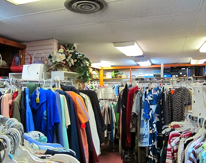 The clothing racks stand like colorful soldiers, each hanger a potential wardrobe revolution waiting to happen. Vintage fashion without vintage prices.