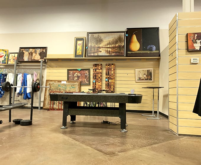 The art section offers everything from pastoral landscapes to quirky still lifes, plus a bonus air hockey table for impromptu tournaments.