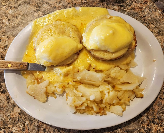 Eggs Benedict that would make the Pope jealous—perfectly poached eggs nestled on English muffins, draped in hollandaise that's practically liquid gold.