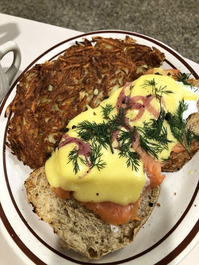Eggs Benedict that belongs in the Breakfast Hall of Fame—perfectly poached eggs, hollandaise that achieves that magical butter-lemon balance, and hash browns crisped to golden perfection.