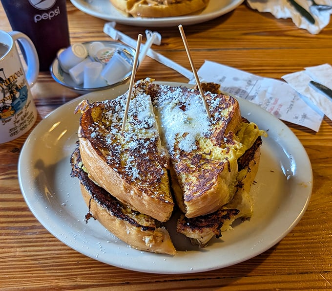 French toast that's had a proper Southern education – thick-cut, golden-brown, and dressed up enough to make breakfast feel like an occasion.