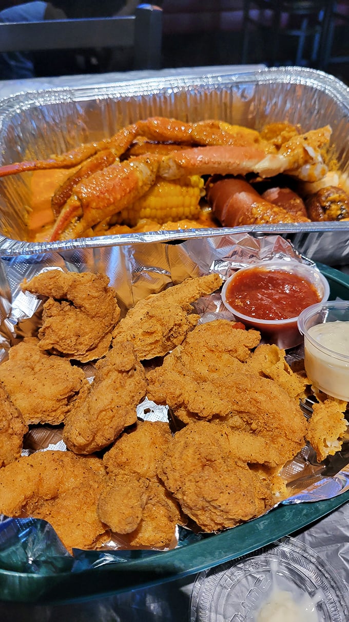 Golden-fried perfection meets seafood boil abundance. This platter doesn't just feed your hunger—it feeds your soul's deepest Cajun cravings.