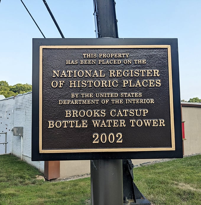 The National Register of Historic Places plaque confirms what we already knew—this isn't just any water tower, it's American history with a side of fries.