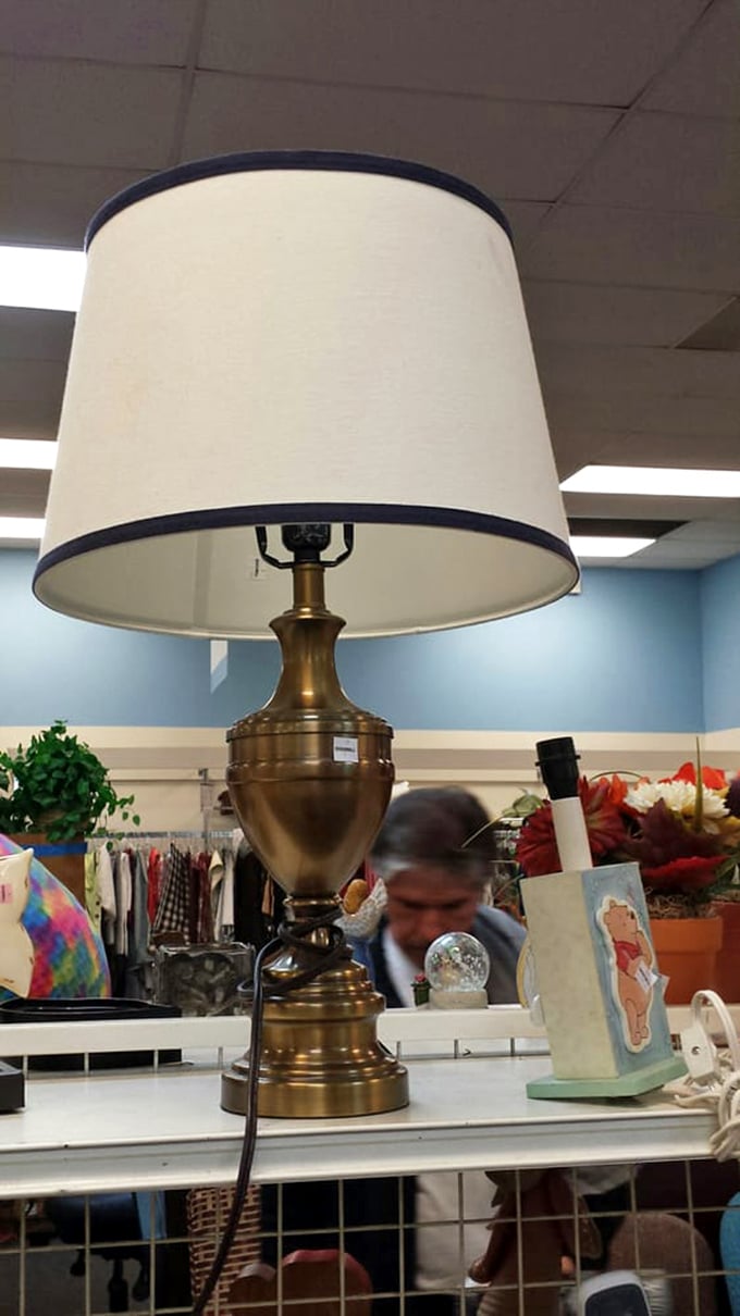 This brass lamp isn't just illuminating space—it's lighting up someone's "I can't believe I found this" story for years to come.