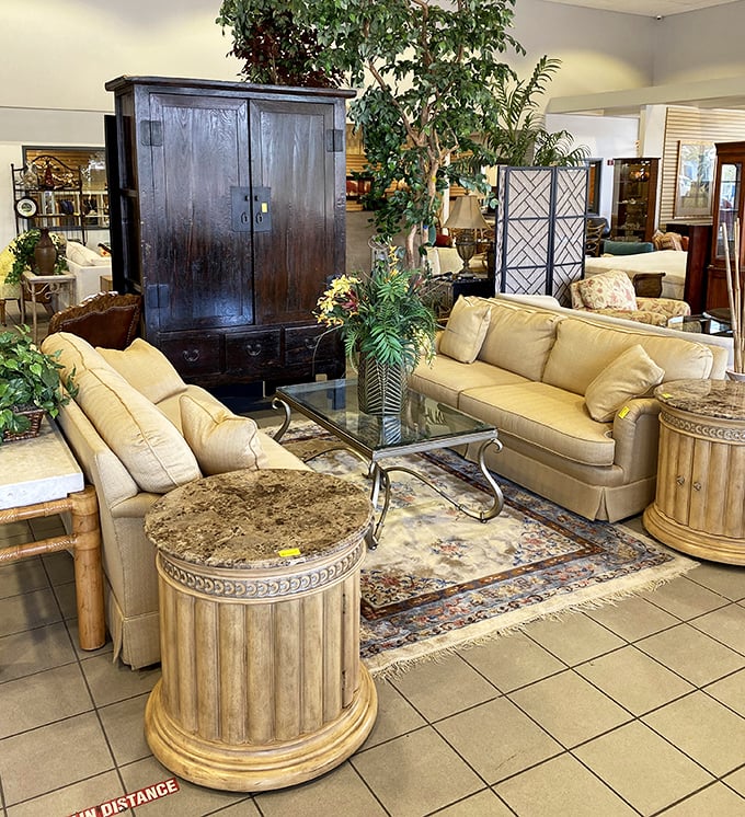 Sophisticated living room setups that whisper "Naples luxury" while shouting "incredible bargain"—complete with classical columns and lush greenery.