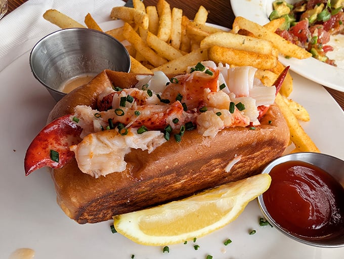 Behold the lobster roll that launched a thousand road trips! Chunks of sweet meat nestled in buttery perfection, making Connecticut and Maine nervously look westward.