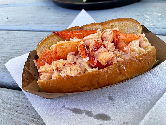 Connecticut-style lobster roll perfection – warm, buttery chunks of sweet meat nestled in a perfectly toasted roll. No mayo needed in these parts!