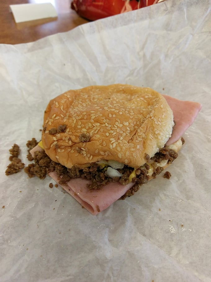 Behold the famous loose meat sandwich—not quite a burger, not quite a sloppy joe, but entirely its own delicious category.