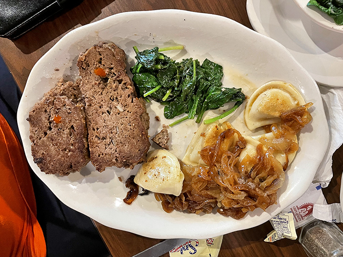 Meatloaf that doesn't apologize for being meatloaf, served with greens and pierogies – Pennsylvania's way of saying "vegetables are important, but so is more carbs."