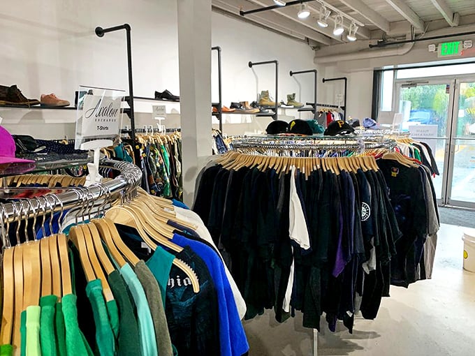 The men's section defies the myth that secondhand shopping favors women – these color-coded racks offer everything from basics to statement pieces.