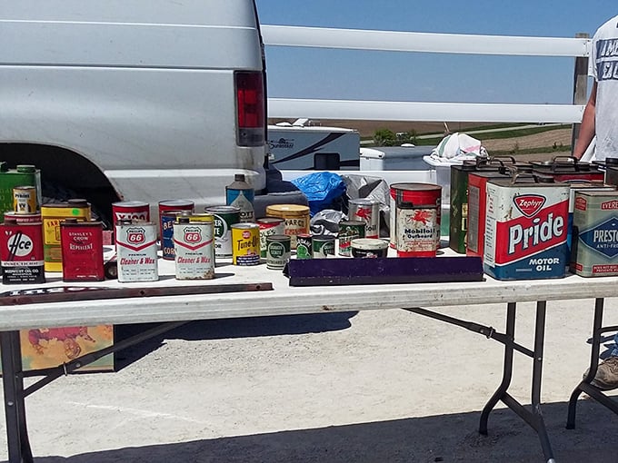Automotive nostalgia by the tableful. These vintage oil cans aren't just containers—they're time capsules from when gas stations had personality and charm.