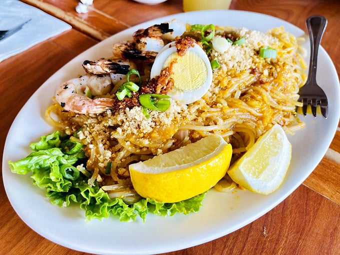 Pancit Palabok that would make your grandmother weep with joy. Those plump shrimp and that perfect egg aren't just toppings—they're a declaration of culinary love.