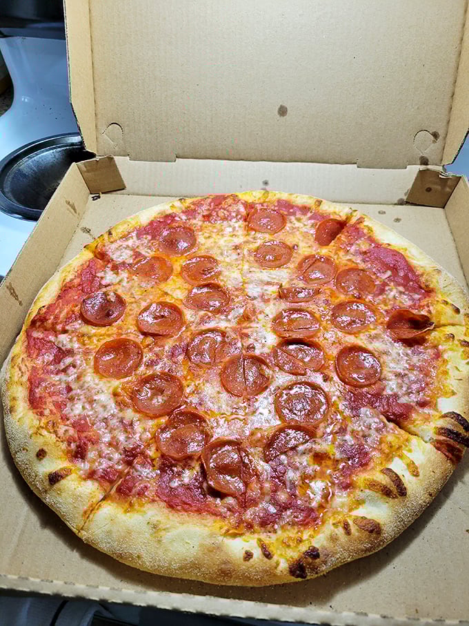 Pepperoni that curls into little flavor cups, holding precious pools of savory goodness. This is pizza engineering at its finest.