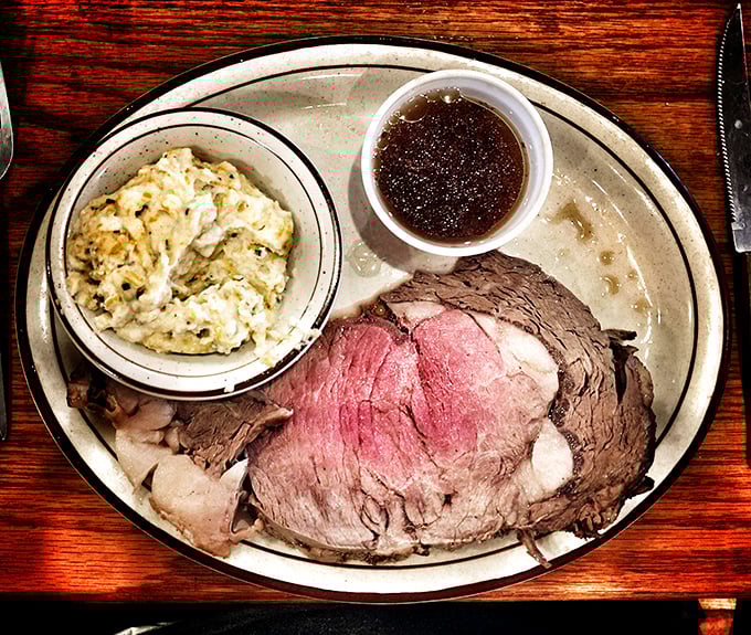Behold the star of the show: prime rib that would make a vegetarian consider a career change, served with creamy sides and savory au jus.