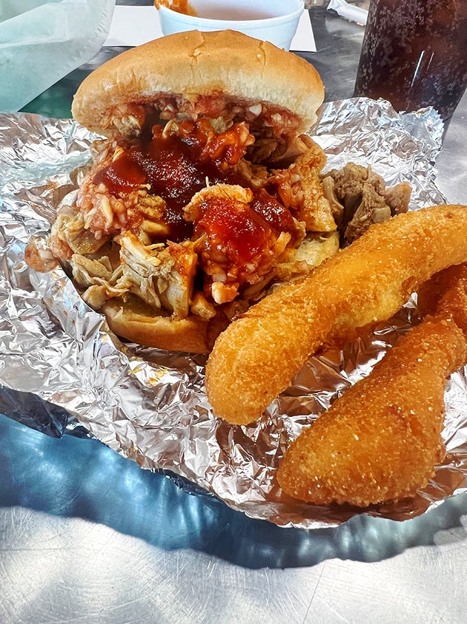 This isn't just a sandwich; it's a masterpiece of pulled pork perfection, where smoke-kissed meat meets tangy sauce in harmonious bliss.