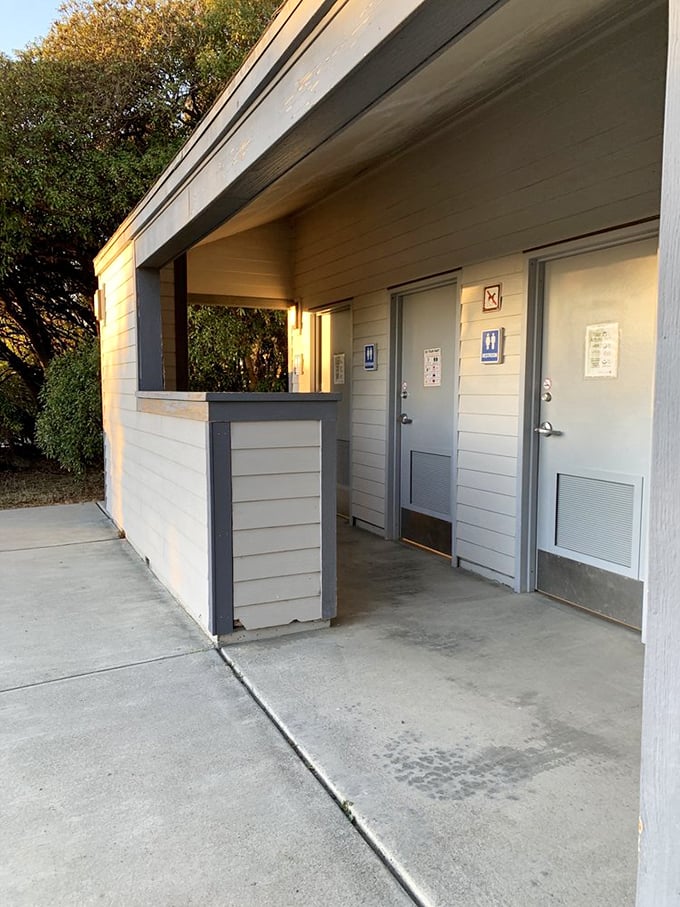 Even park facilities embrace coastal charm—these restrooms might lack five-star amenities, but they offer million-dollar proximity to nature's grandeur.