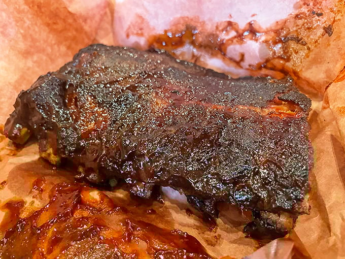 These ribs have that perfect bark that makes barbecue aficionados weak in the knees—a smoke ring that would make Texas nod in approval.