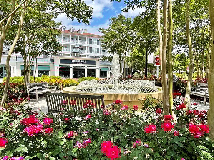 A fountain surrounded by vibrant roses creates the perfect resting spot. Shopping stamina requires strategic bench breaks and flower appreciation.