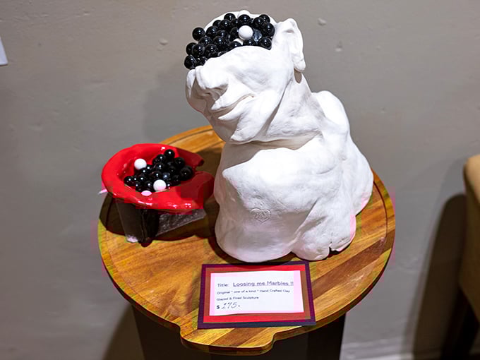 This whimsical sculpture proves one person's lost marbles are another's artistic masterpiece. Literally.