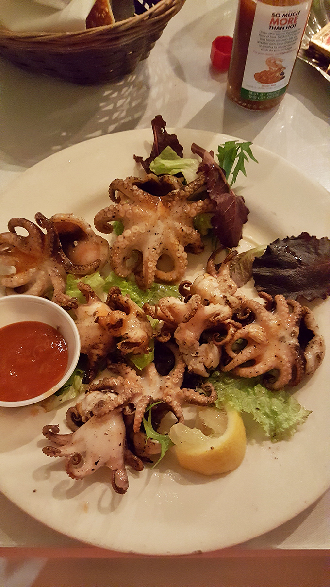 This grilled octopus isn't just tender—it's had more therapy than most of us. The perfect char marks are like nature's way of saying "you're welcome."