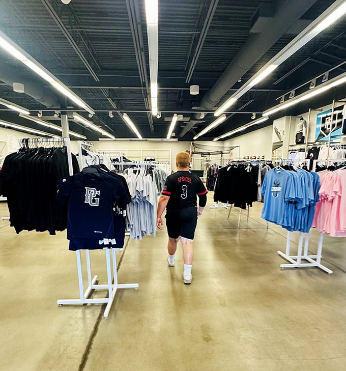 Rows of athletic wear await their forever homes, where they'll likely spend more time in dresser drawers than actual gyms. We've all been there.